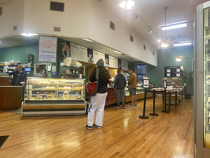 The morning pilgrimage in progress &ndash; locals know that good things come to those who wait in the efficiently moving Community Bakery line.