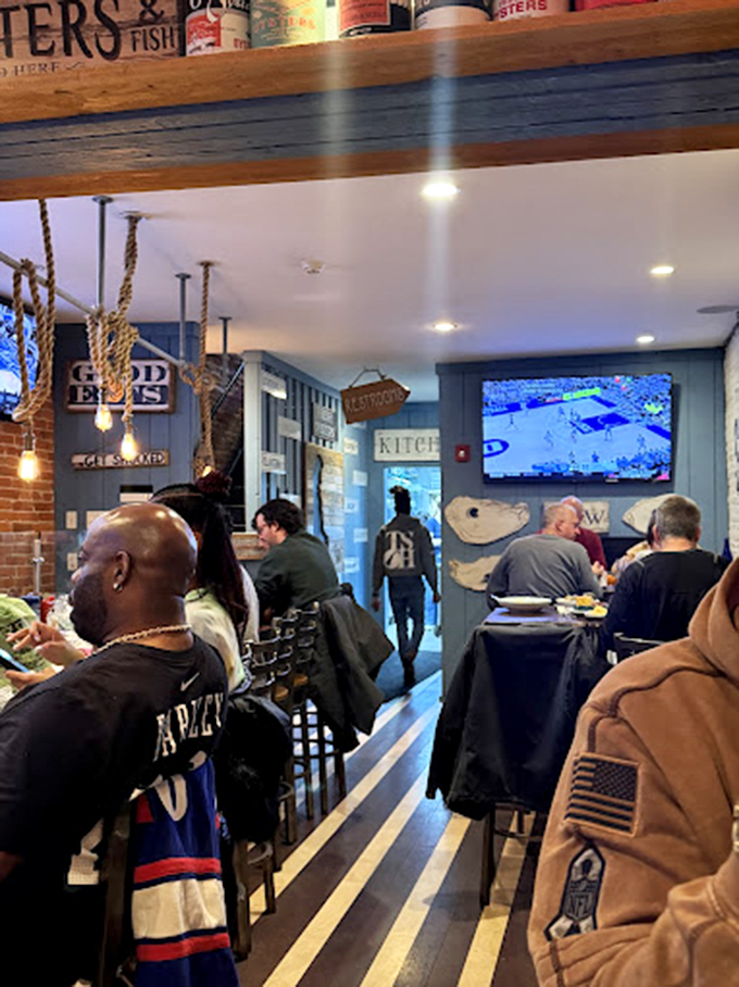 Where locals gather to worship at the altar of good seafood. The striped floor leads all conversations back to the oyster bar.