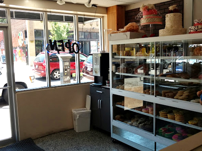 Sunshine streams through the windows, illuminating shelves of freshly baked treasures. Even the light knows where to find the good stuff.