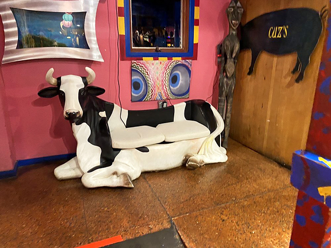A cow statue that's seen things. If these walls could talk, they'd probably ask for the ribeye, medium rare.