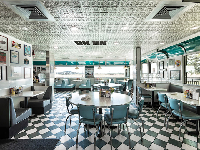 The diner's interior is a masterclass in mid-century design&mdash;where turquoise, chrome, and checkerboard create a space that Instagram filters try desperately to replicate.