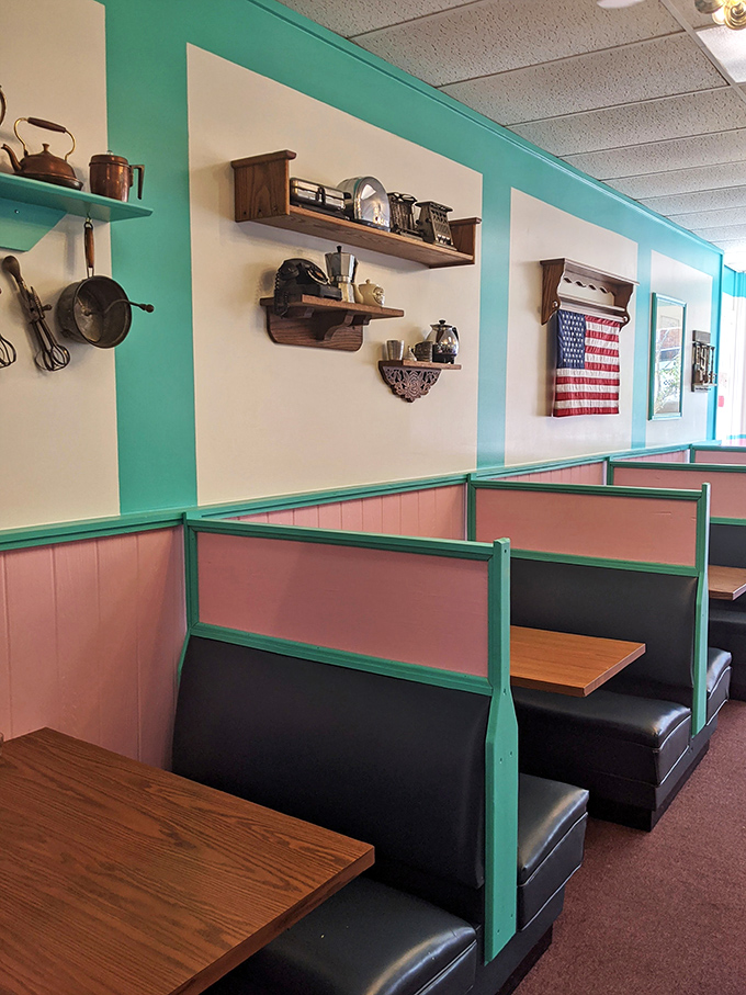 Norman Rockwell would approve of these booth dividers and Americana wall decor. Not designed by an Instagram influencer, but by decades of small-town tradition.