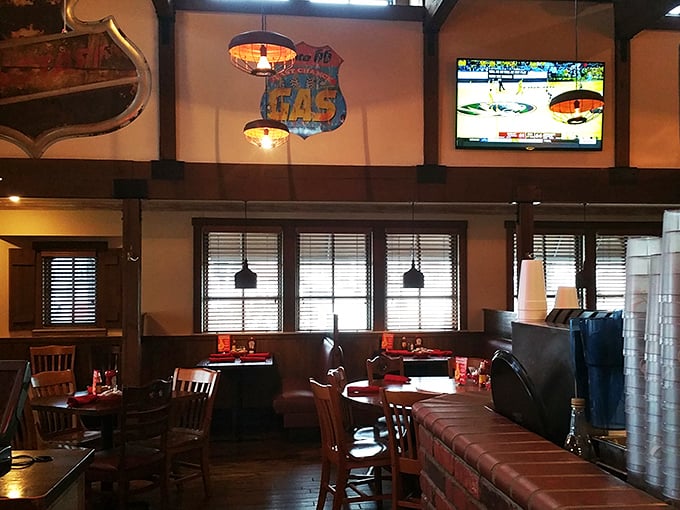 Vintage signs and memorabilia create a museum of comfort where Route 66 nostalgia meets Midwestern hospitality.