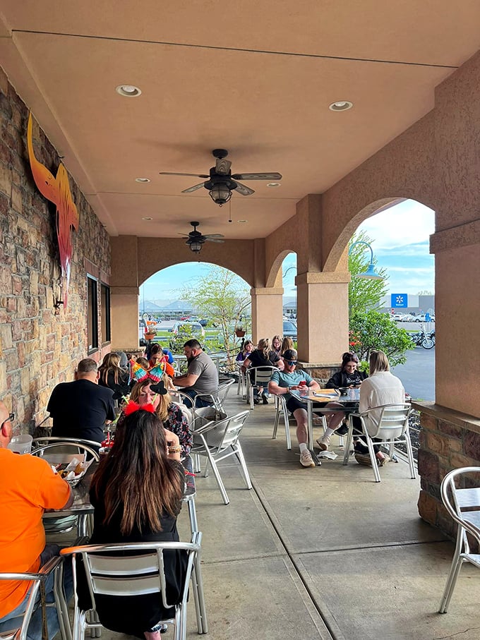 The outdoor patio: where strangers become friends and friends become family, all united by the universal language of good food.