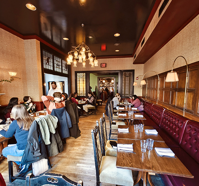 The dining room hums with that perfect energy&mdash;not too quiet, not too loud&mdash;where meals become memories and strangers at neighboring tables become characters in your evening's story.