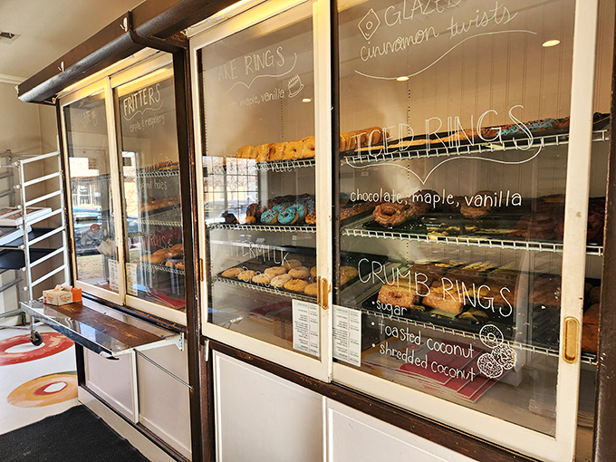 The glass case serves as a window into a better world&mdash;one where calories don't count and frosting is considered a food group.