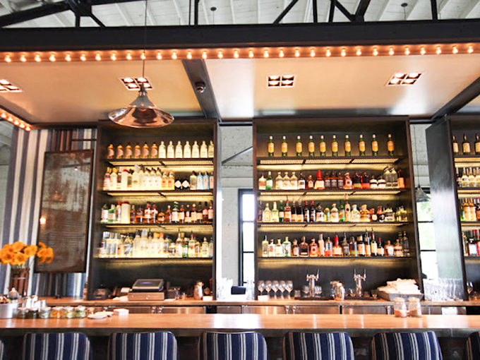 Behind this bar, mixologists orchestrate liquid symphonies that complement the ocean's bounty with the precision of seasoned conductors.