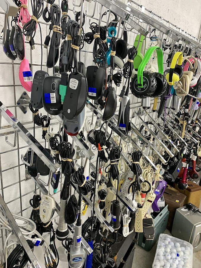 The electronics wall: where yesterday's cutting-edge technology comes for its second act. One person's obsolete is another's nostalgic gold mine.