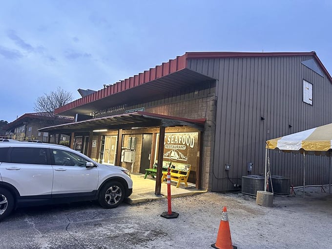 Twilight at the seafood sanctuary. Even as day fades, the promise of perfectly fried coastal treasures shines bright.