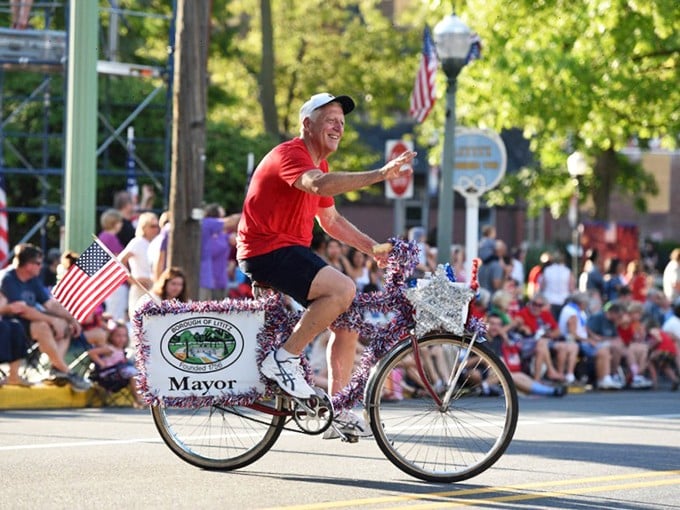 Lititz embraces small-town traditions like parades where the mayor's transportation budget clearly prioritizes charm over horsepower.