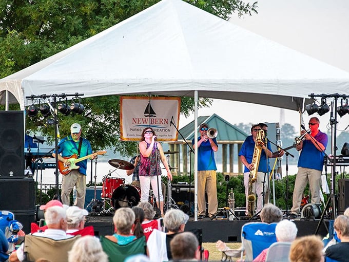 Outdoor concerts bring the community together by the water, where lawn chairs and live music create the perfect summer evening soundtrack.