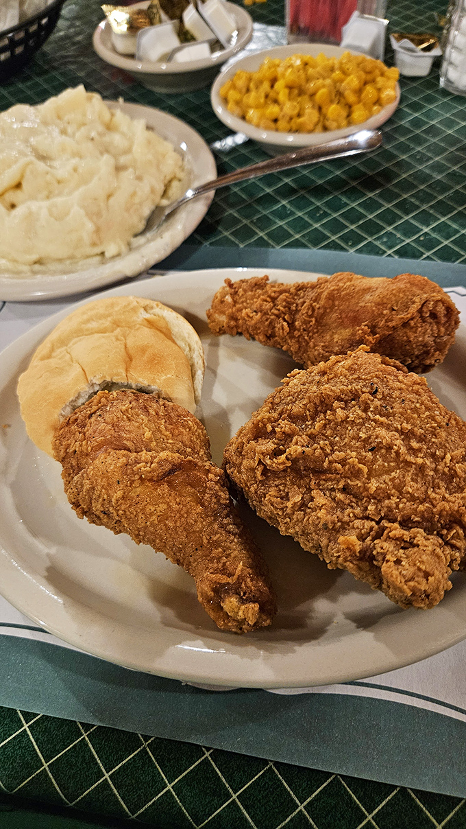 Fried chicken so perfectly golden it belongs in Fort Knox. Paired with mashed potatoes that clearly never met a box or powder in their life.