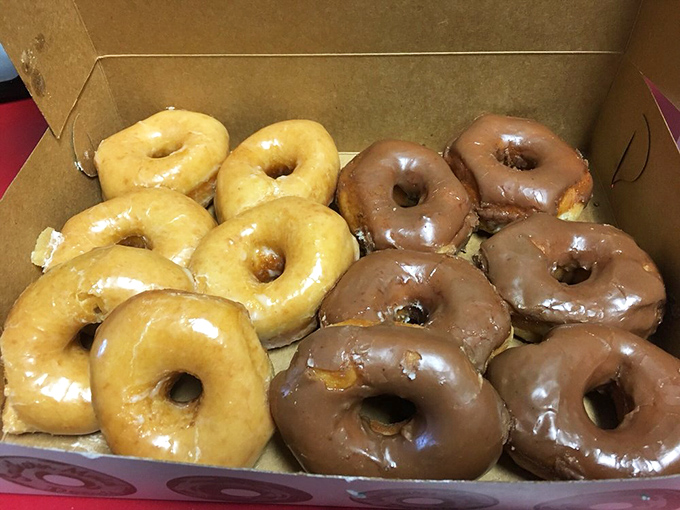 A dozen perfect circles of joy&mdash;half dressed in chocolate, half in classic glaze&mdash;ready to transform an ordinary morning into celebration.