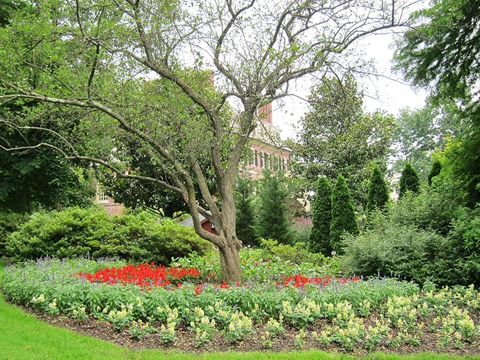 Summer brings a different palette to Sherwood Gardens, where verdant greens create a cooling oasis in Baltimore's urban landscape.