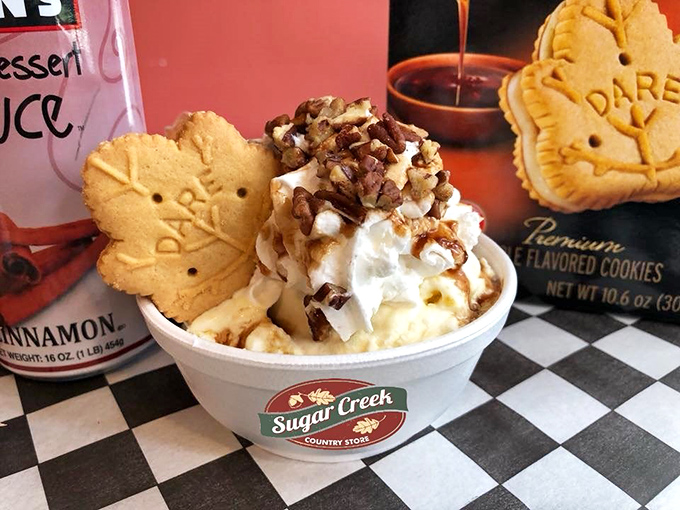 An ice cream sundae that understands the importance of texture contrast&mdash;soft cream, crunchy nuts, and those maple leaf cookies stealing the show.