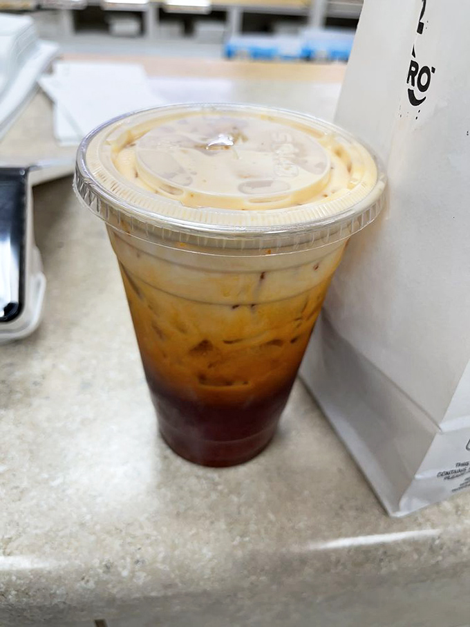 Iced coffee: the unsung hero of the breakfast experience, standing by faithfully while the donuts get all the glory.