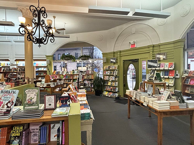 Wooden display stands showcase featured titles like love notes to literature, guiding you toward your next great read.
