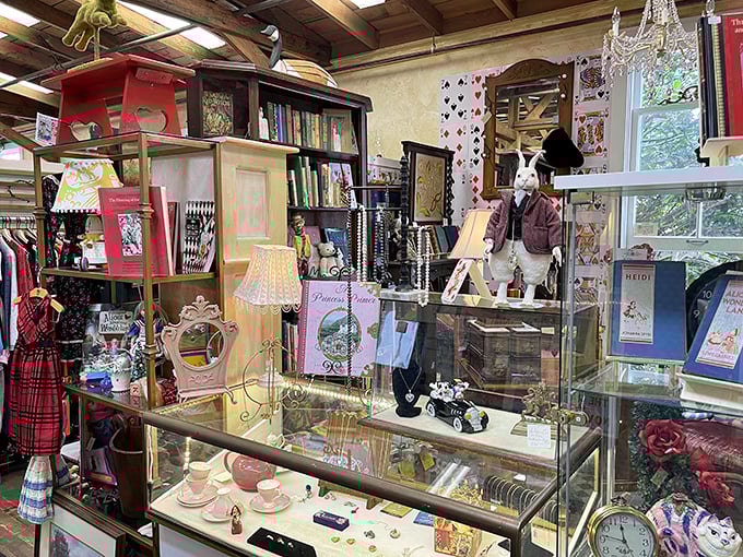Childhood storybooks neighbor delicate teacups behind protective glass, a museum-quality display of genteel nostalgia that makes adults whisper, "I had that!"