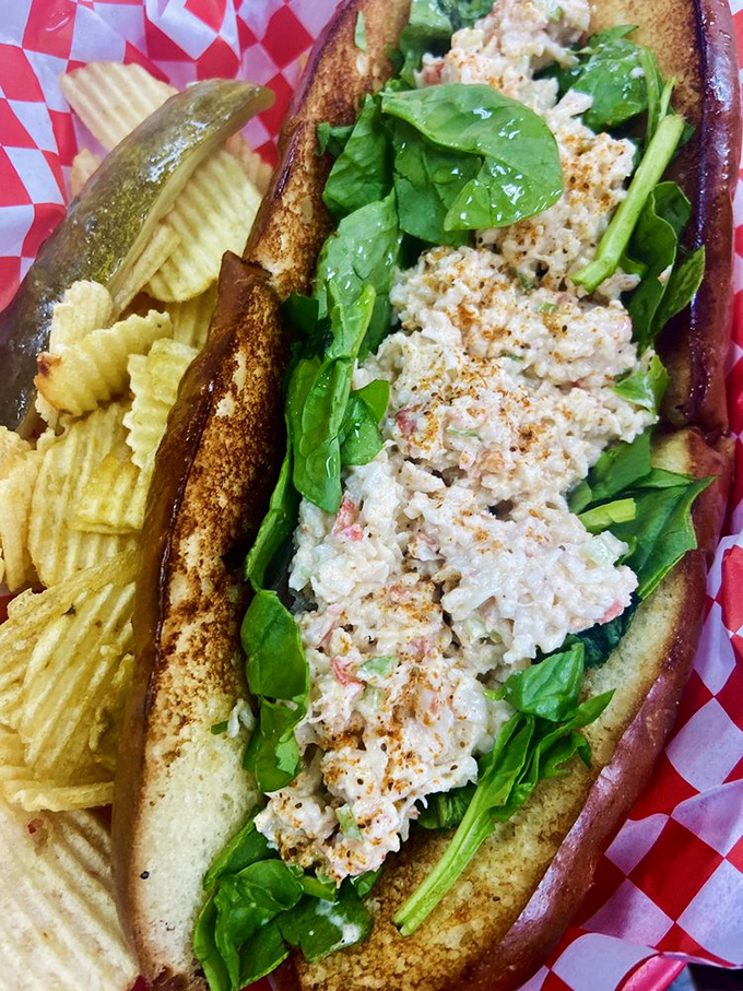 Creamy chicken salad nestled in a perfectly toasted roll&mdash;comfort food that makes you want to cancel your afternoon plans.