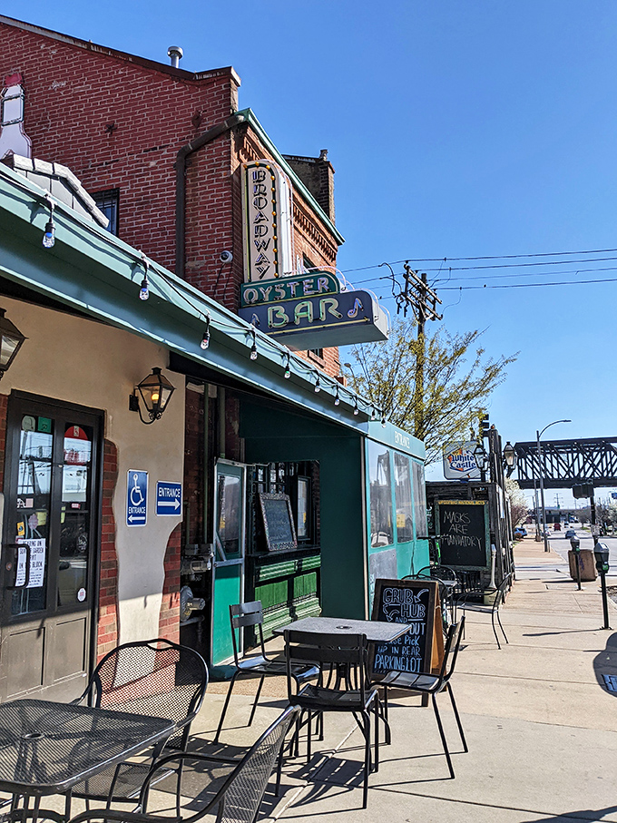 Sidewalk seating that feels like a front-row ticket to the best show in town: people-watching with a side of crawfish and cold beer.