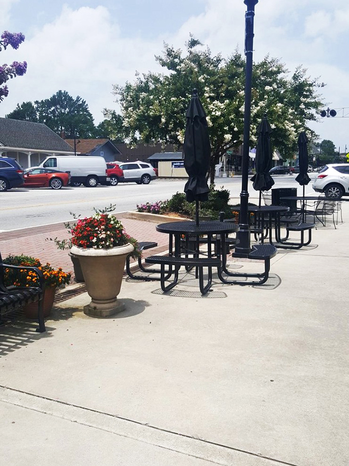 Outside seating where Tucker's summer blooms provide the backdrop for post-meal conversations and sweet tea refills.