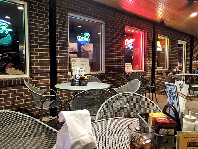 Even the outdoor seating has personality. Those neon signs in the window are like beacons calling to hungry travelers: "Salvation this way."