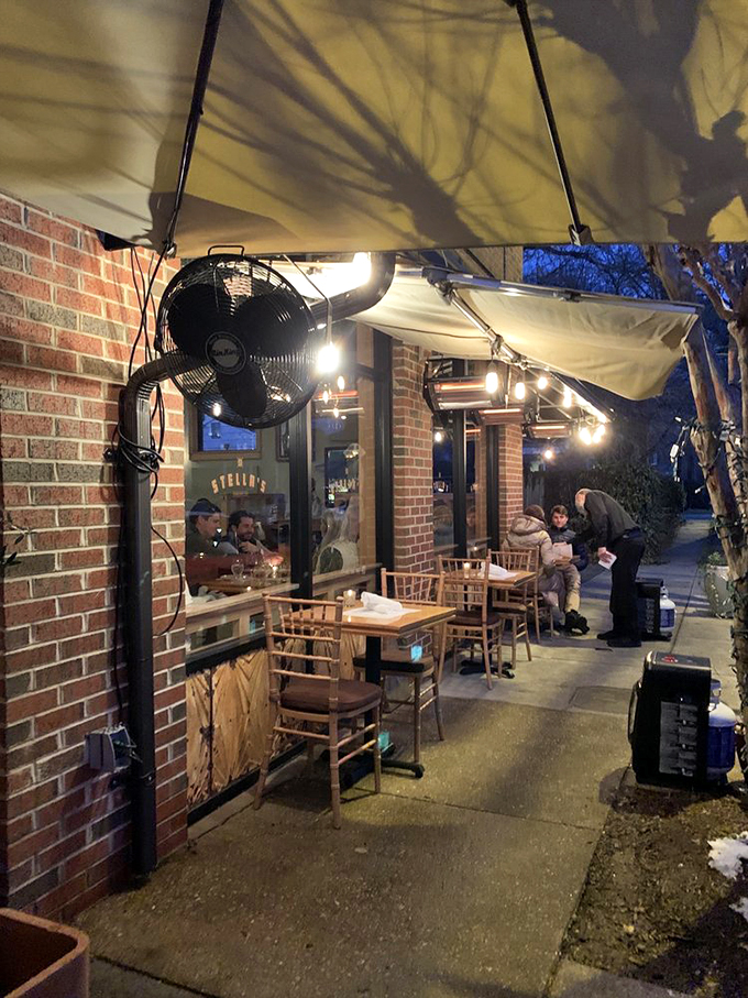 Even in the evening chill, Stella's outdoor seating remains irresistible. String lights transform simple sidewalk dining into something magical.