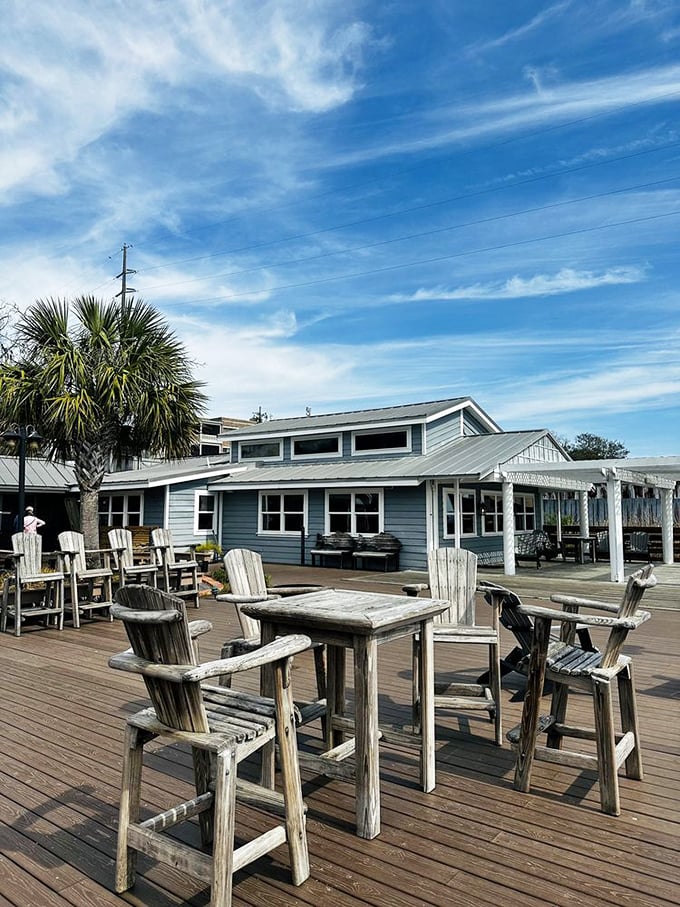 High-backed Adirondack chairs on the weathered deck create the perfect perch for watching boats return with tomorrow's specials.