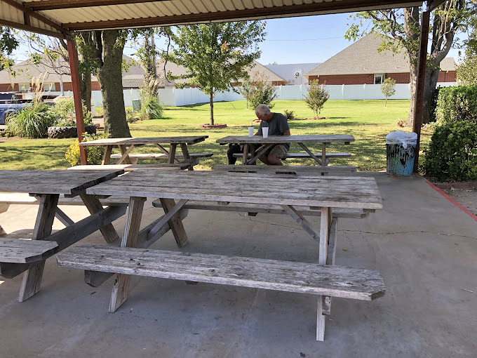 Outdoor picnic tables under Oklahoma skies offer the perfect setting for that post-burger food coma&mdash;nature's dining room with a side of fresh air.