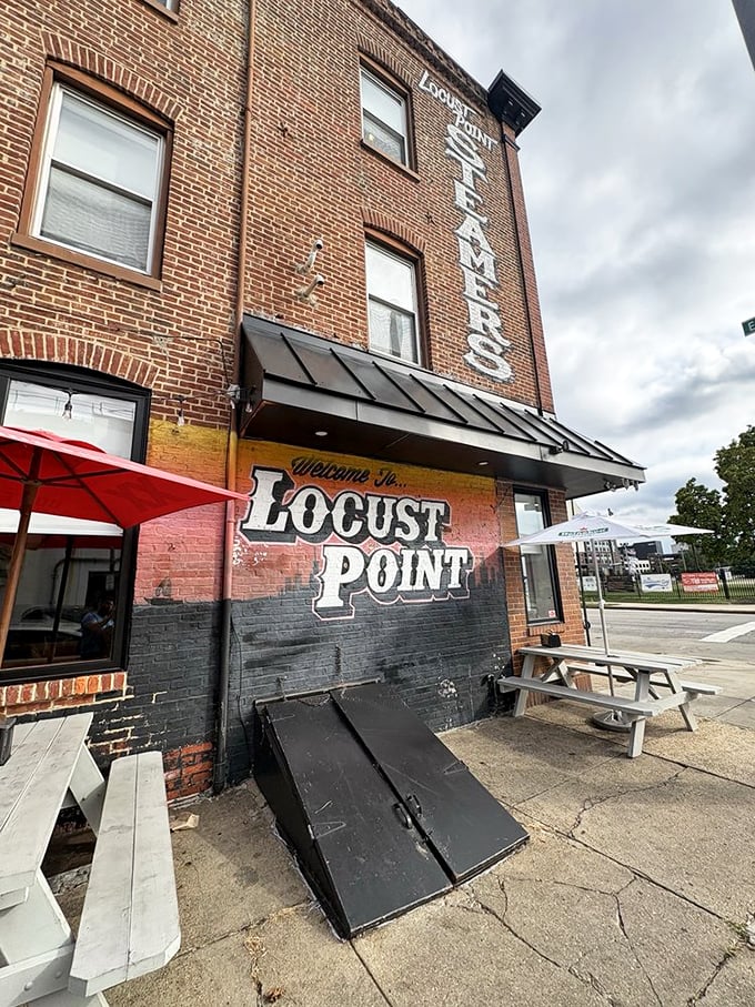 The "Welcome to Locust Point" mural might as well add: "Where the crabmeat is sweet and the Old Bay is generous."