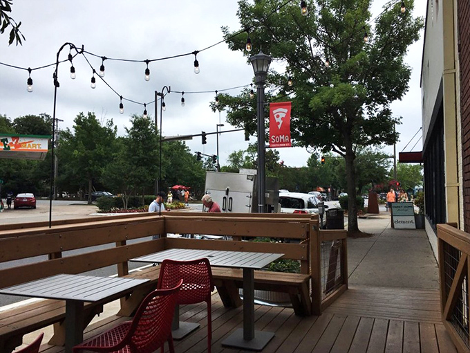The patio where summer evenings stretch into night under string lights. SoMa's energy flows through this wooden deck, inviting you to linger longer.