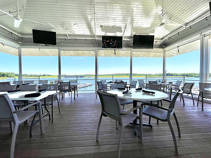 The patio offers Eagle Creek Reservoir views that make you question why you ever vacation elsewhere when Indiana delivers this waterfront magic.