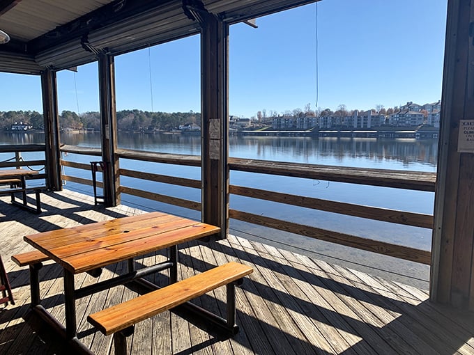 Picnic tables with million-dollar views&mdash;proof that sometimes the simplest seats offer the most spectacular dining experiences.