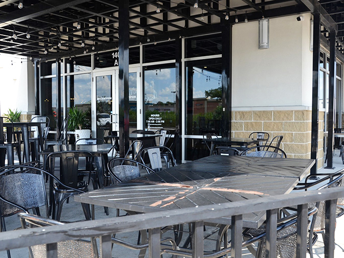 The outdoor seating area awaits your breakfast debates: sweet or savory? Both? The patio practically demands you linger over another coffee.
