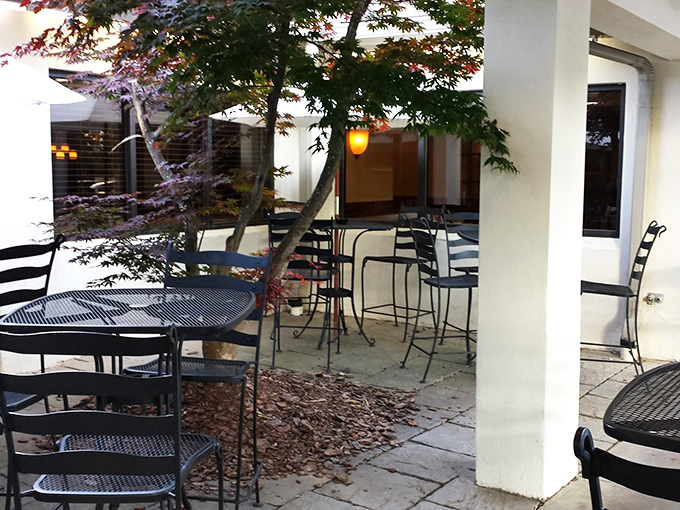 The hidden patio offers a tranquil escape from Atlanta's hustle. Those Japanese maples have witnessed more first dates and celebrations than most matchmakers.