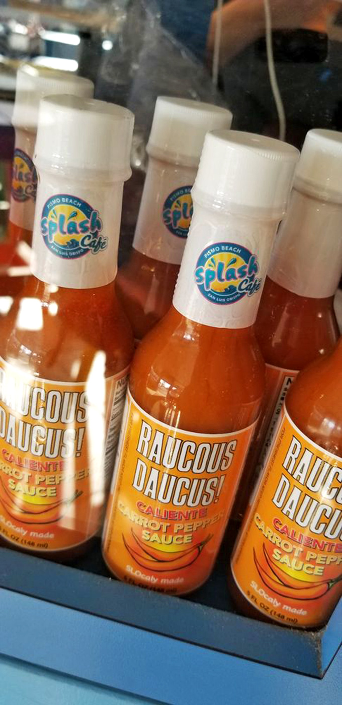 Their house-made hot sauce bottles stand like fiery soldiers, ready to add a California kick to whatever lands on your plate.