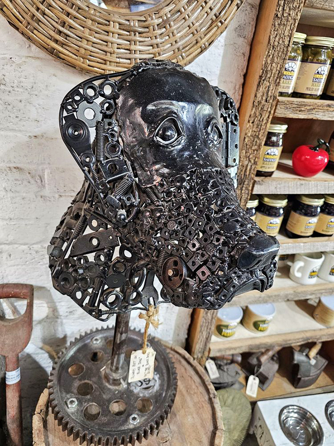 Metal artistry at its finest! This canine sculpture made from repurposed hardware parts perfectly captures the spirit of Black Dog Salvage's creative vision.