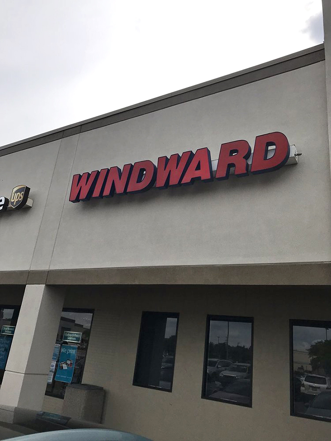 The WINDWARD sign glows like a beacon for hungry travelers. Even in daylight, it signals "abandon diet, all ye who enter here."