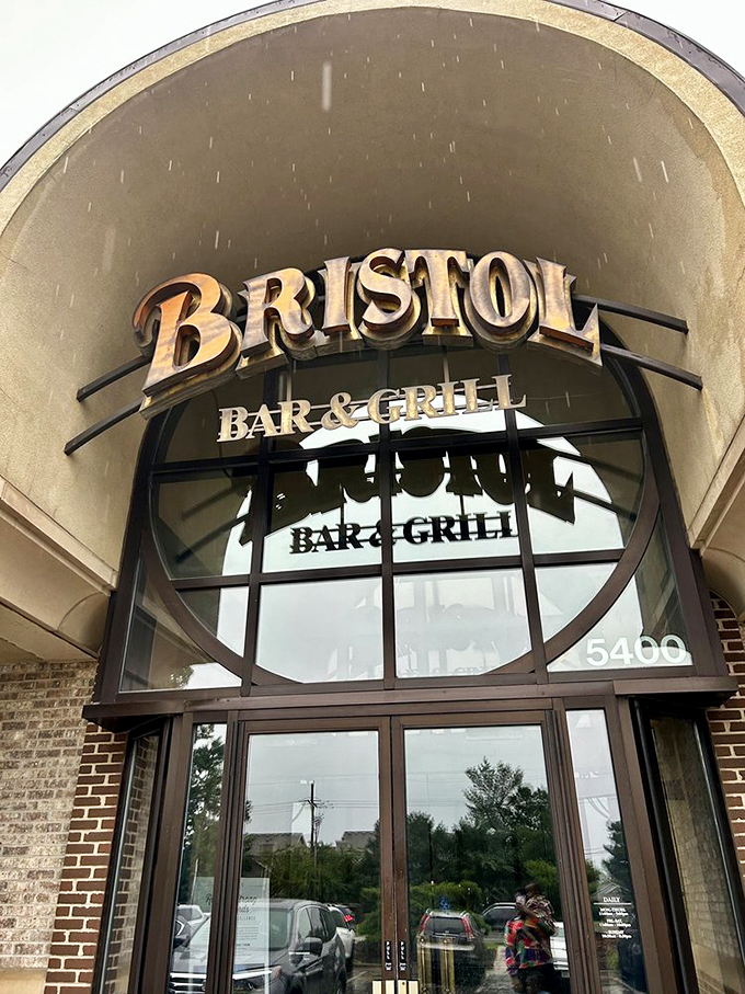 The Bristol sign glows like a beacon through raindrops, promising warm shelter and hot seafood&mdash;two things particularly appreciated during a Midwest downpour.