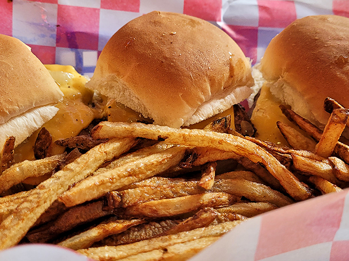 Sliders aren't just mini burgers&mdash;they're portion control for people who can't control their portions. The mountain of fries helps.