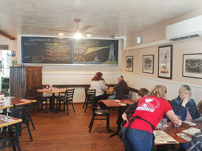 Service with a smile in a bustling dining room. The staff moves with the efficiency of people who know they're delivering joy, one bowl at a time.
