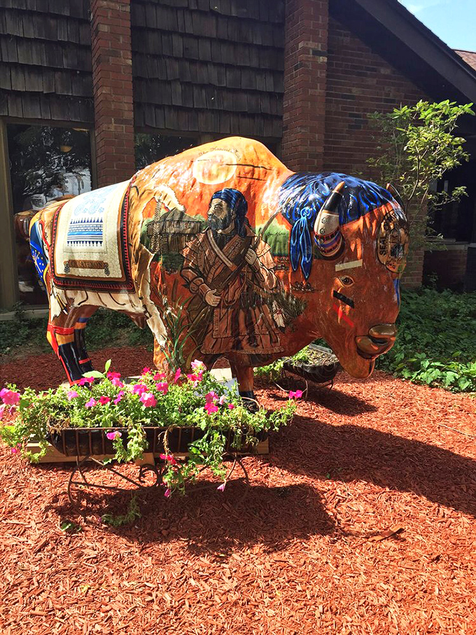 This painted bison statue stands guard outside, a colorful sentinel announcing: "Serious meat appreciation happens here." Art meets appetite.