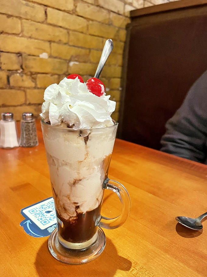 Hot fudge sundae or work of art? At The Bluebird, the line blurs deliciously as whipped cream mountains rise from chocolate valleys.
