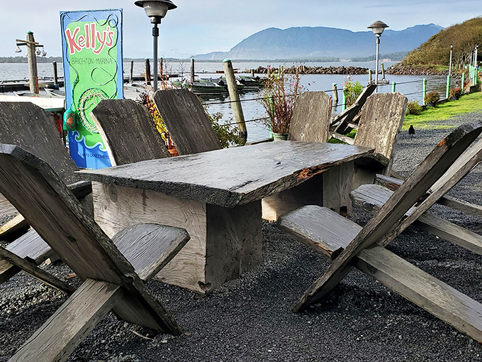 Weathered wooden tables with million-dollar views&mdash;the kind of authentic coastal dining experience no interior designer could ever replicate.