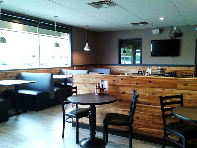 Simple tables and booths let you focus on what matters: the food and the company. No fancy tablecloths needed when the plates steal the show.