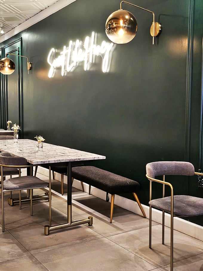 Marble tabletops and plush seating create the ideal setting for extended dining sessions. Why rush perfection? That's not the Texas way.