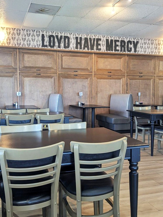 Simple tables set the stage for extraordinary flavors. The restaurant's name hovers above like a blessing for what's about to happen to your taste buds.