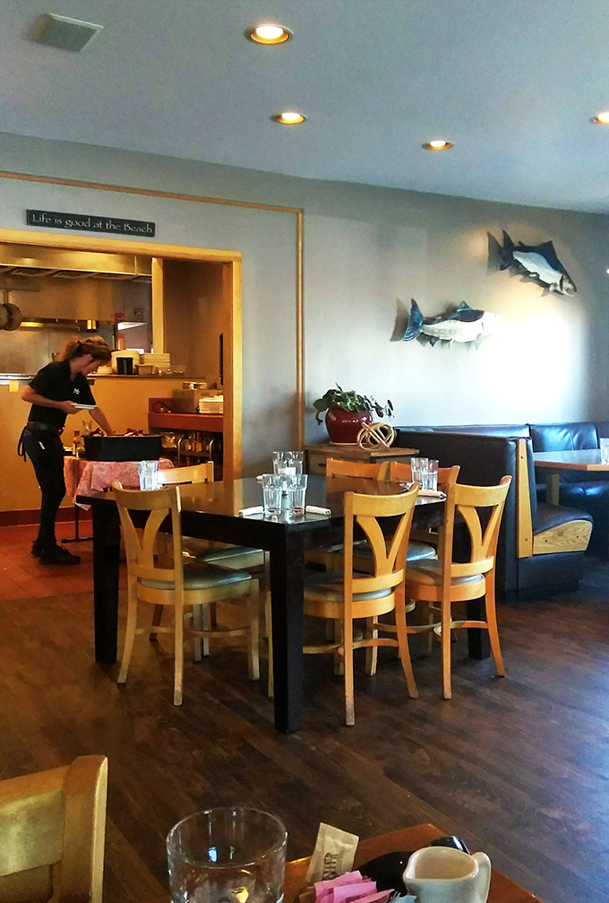 "Life is good at the Beach" proclaims the wall &ndash; while metal fish sculptures swim above diners enjoying that quintessential coastal dining experience.
