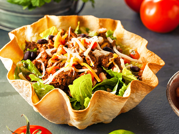 A taco salad that solves the eternal dilemma: "I should eat a salad, but I want a taco." The edible bowl is just showing off.