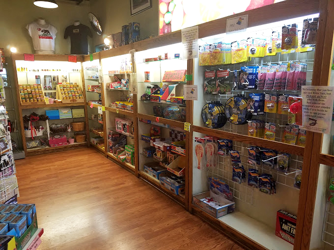 Toys and games section&mdash;where parents negotiate "one small candy and one small toy" deals that inevitably become two of each.